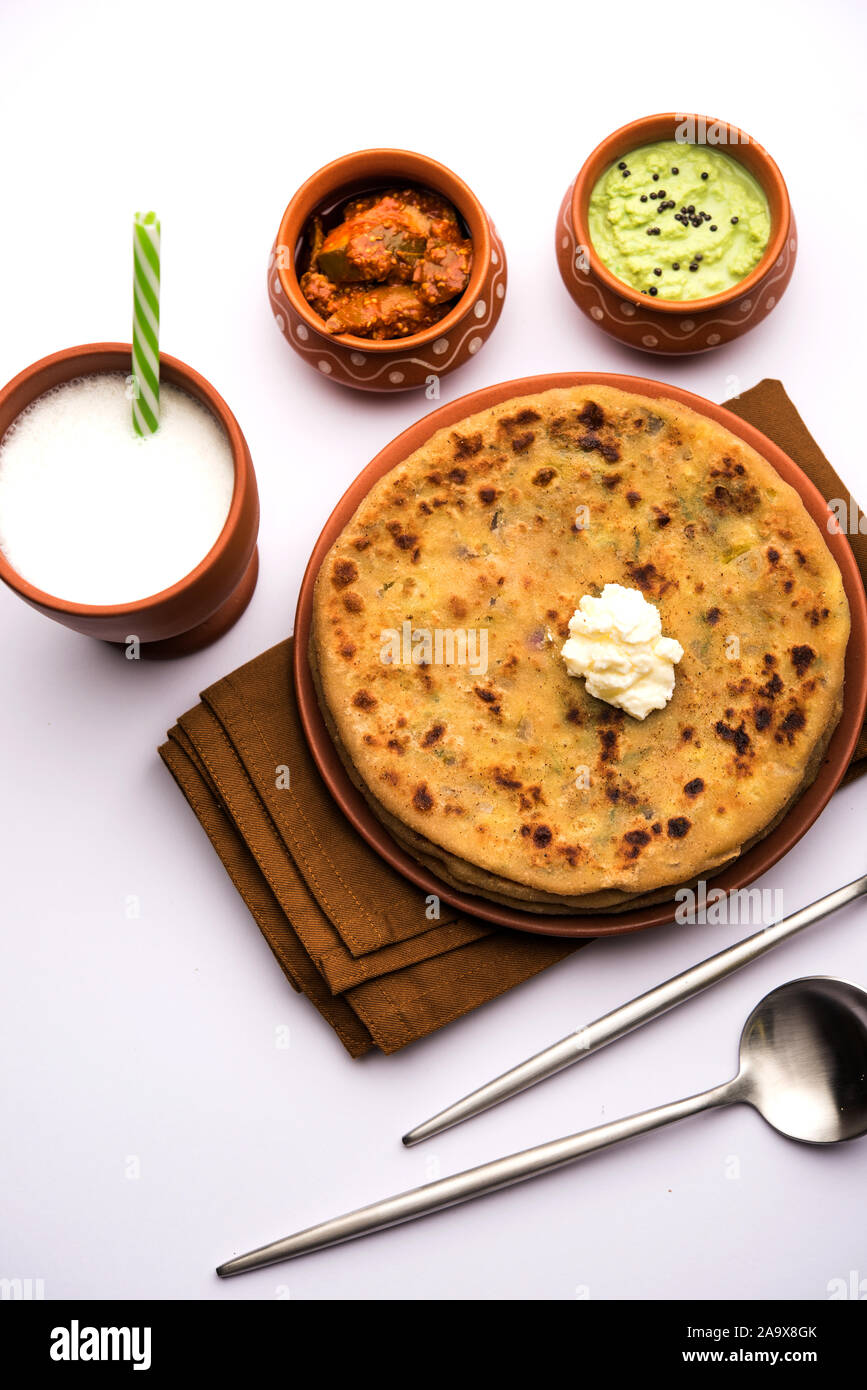 Aloo Paratha / Indian Potato stuffed Flatbread with butter on top ...