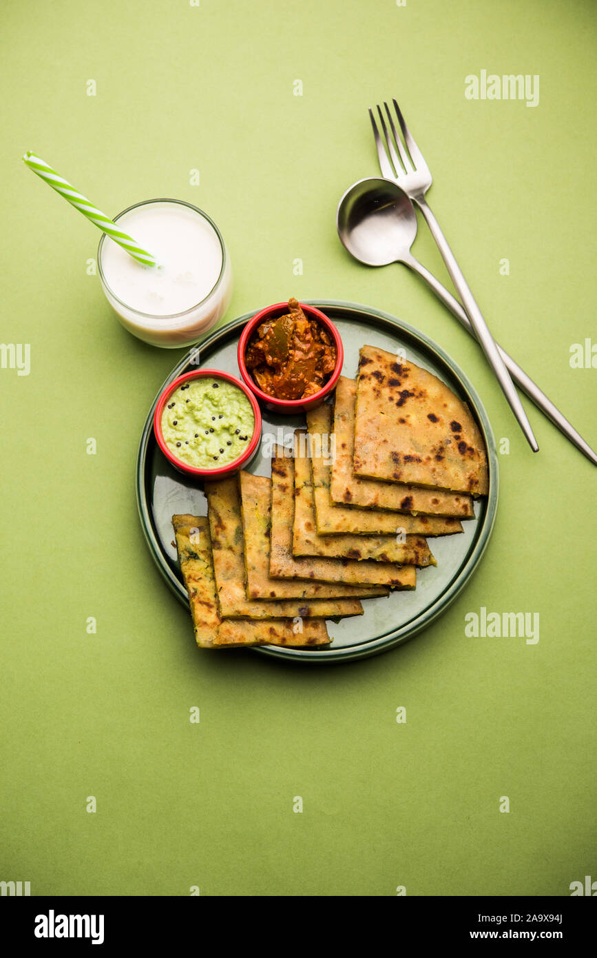 Aloo Paratha / Indian Potato stuffed Flatbread with butter on top ...