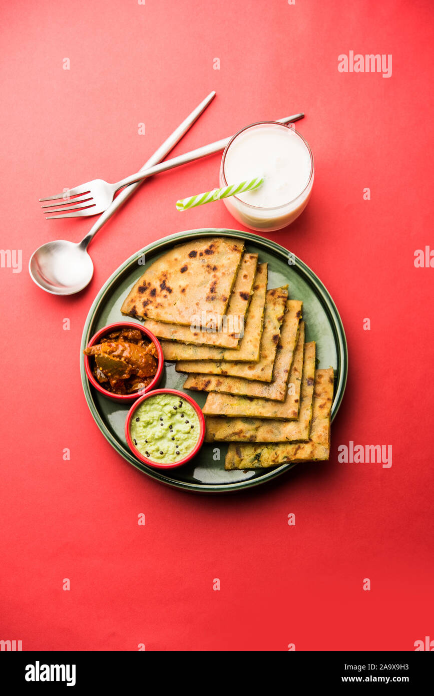 Aloo Paratha / Indian Potato stuffed Flatbread with butter on top ...