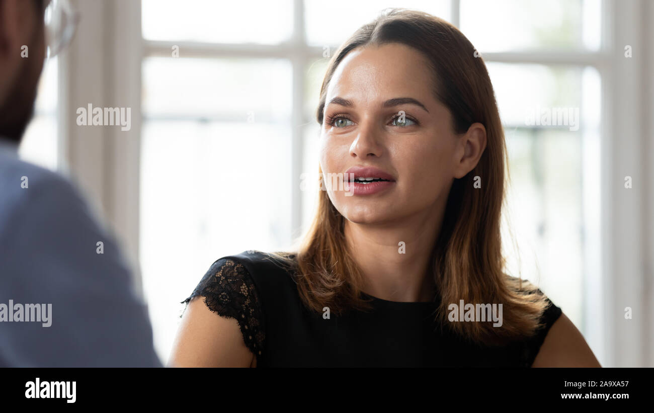 Woman answering questions hi-res stock photography and images - Alamy