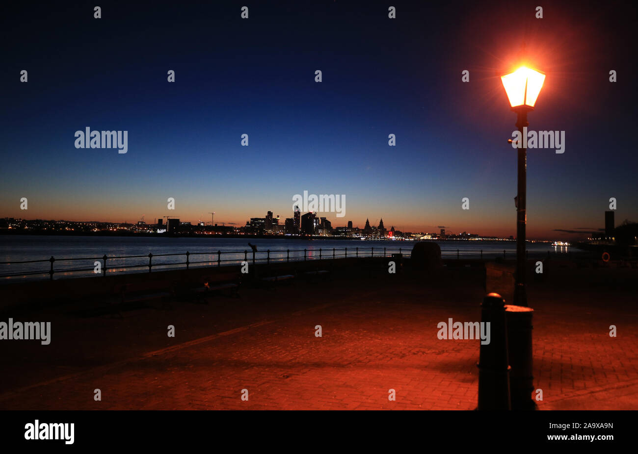 The sun rises over Liverpool Stock Photo - Alamy