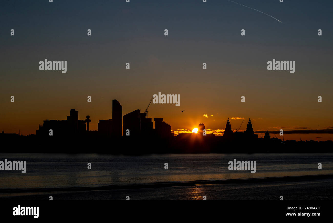 The sun rises over Liverpool Stock Photo - Alamy