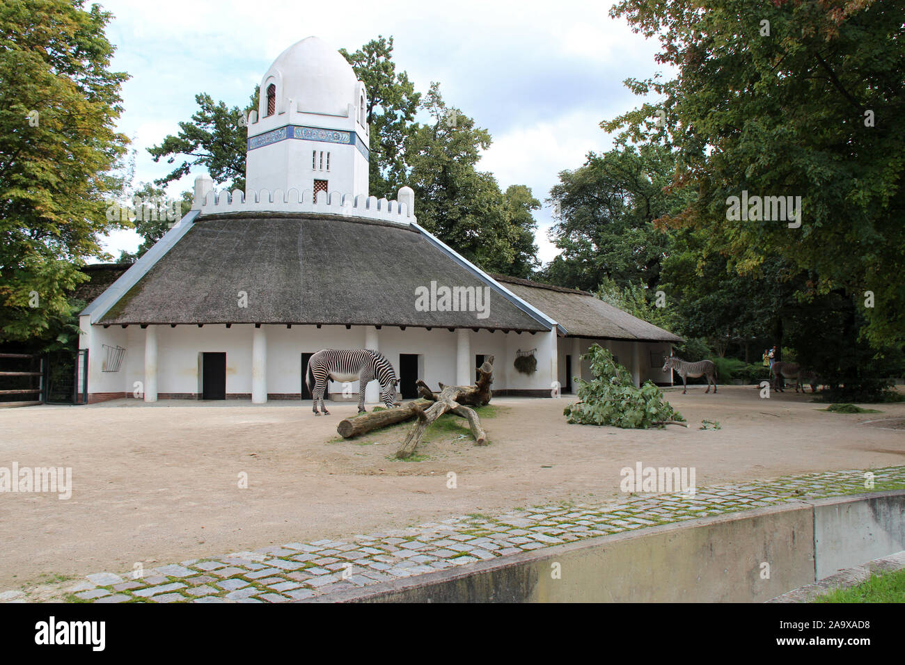 building and zebras in a zoo in berlin (germany Stock Photo - Alamy