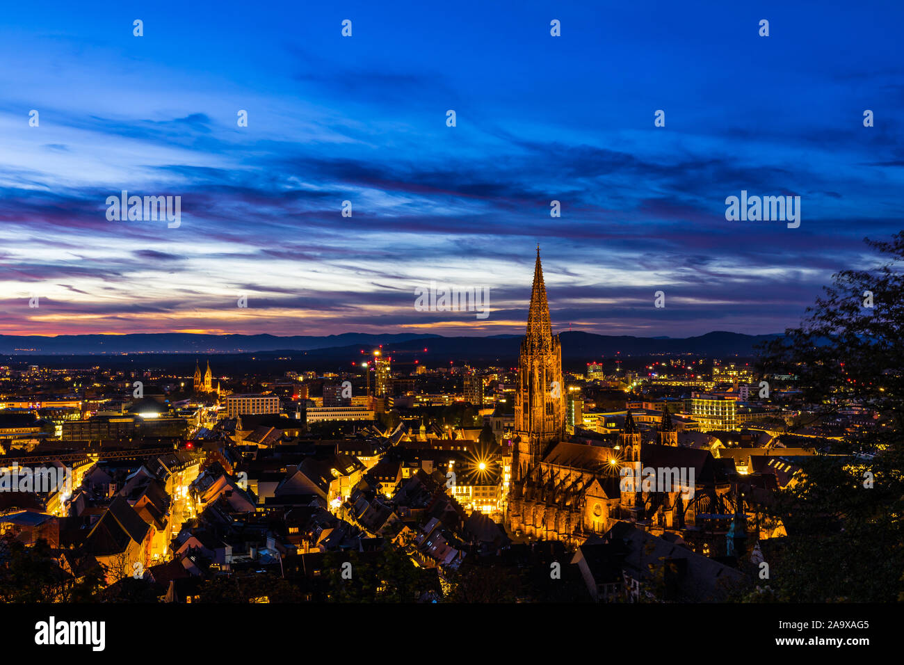 Black forest summer city dusk night city lights hi-res stock ...