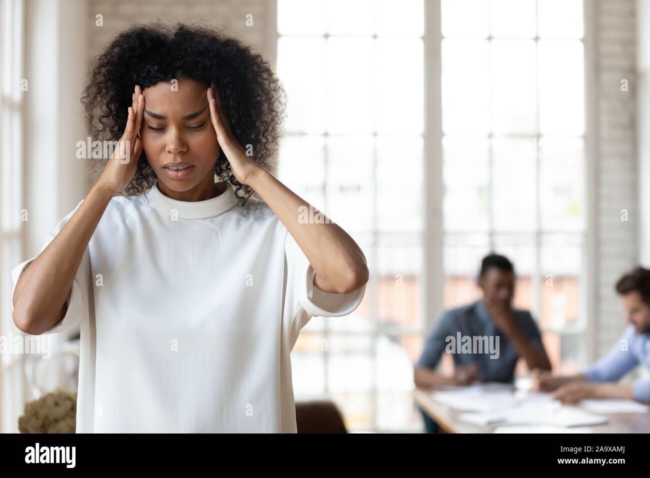 Exhausted company employee migraine hi-res stock photography and images ...
