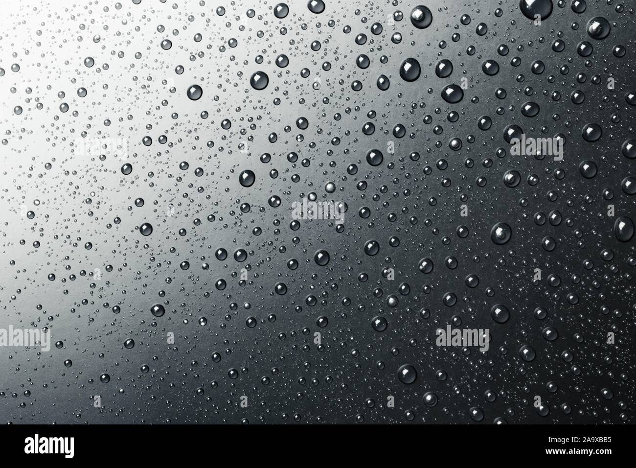 Close-up of water drops on back surface, background Stock Photo - Alamy