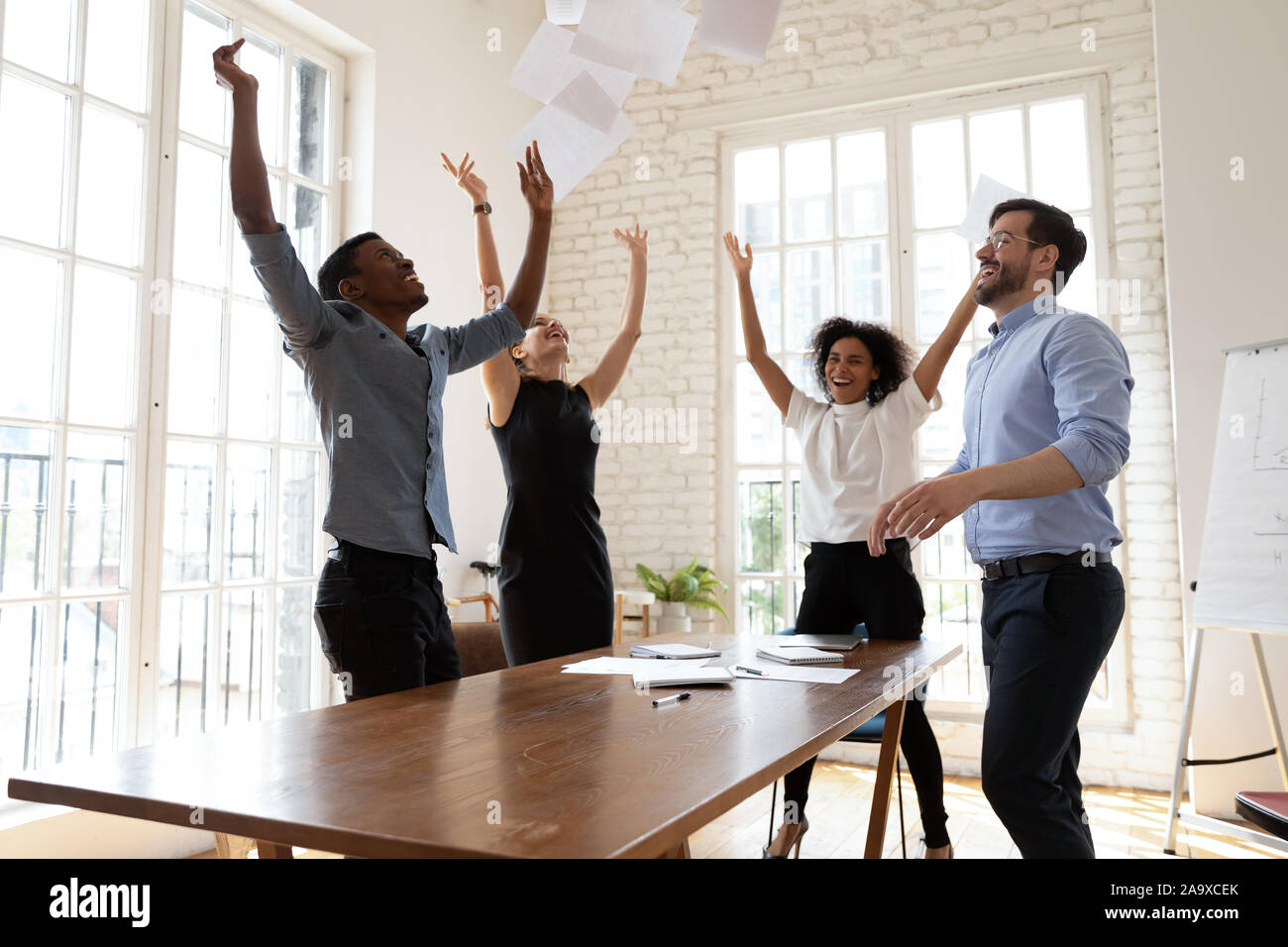 Throwing papers in the air hi-res stock photography and images - Alamy