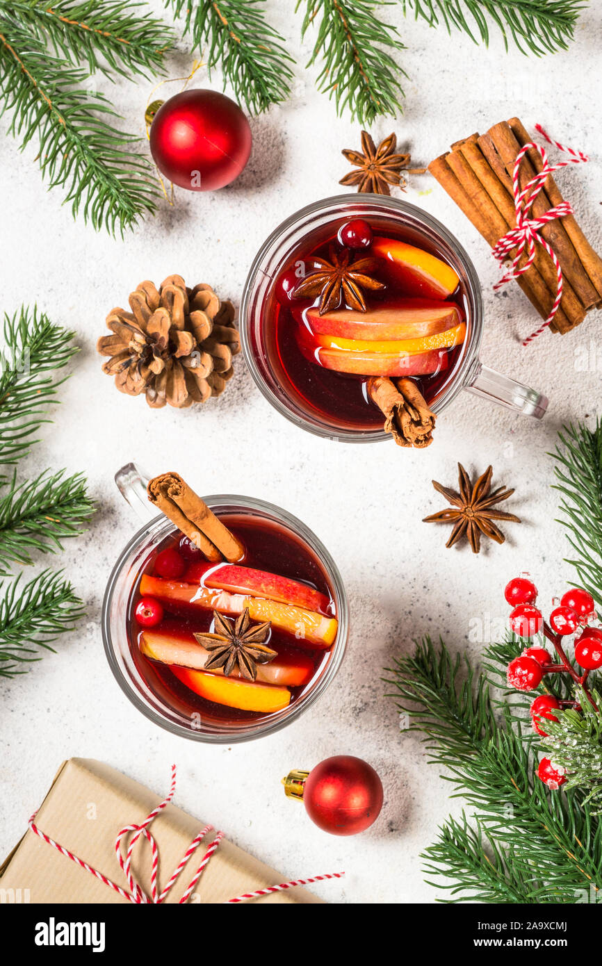Mulled wine with christmas decorations on white Stock Photo - Alamy