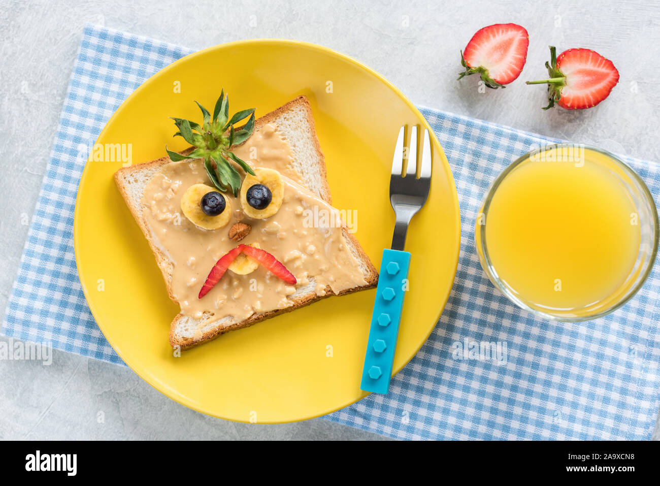 Peanut Butter Sandwich With Funny Angry Face And Glass Of Orange Juice ...