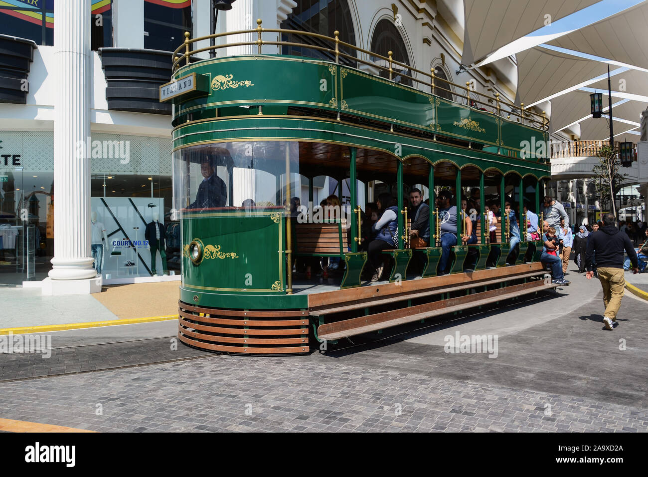 ISTANBUL, TURKEY - APRIL 13, 2014: Green tram in The Vialand Mall, one ...