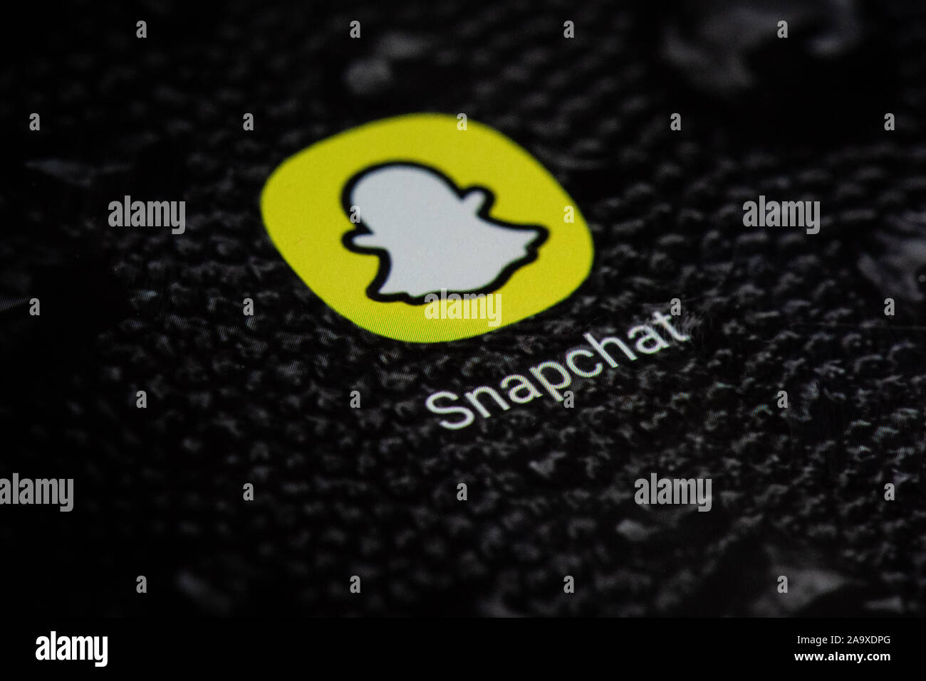 Snapchat on smart phone screen, mobile device, the popular photo and ...