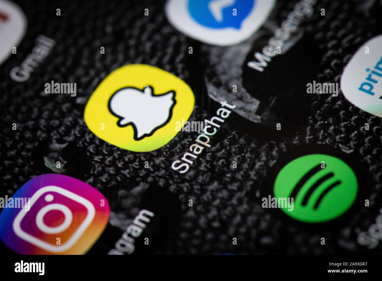 Snapchat on smart phone screen, mobile device, the popular photo and ...