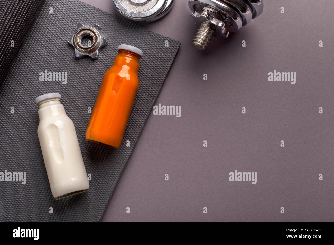 Creative background with two detox drinks on gray Stock Photo - Alamy