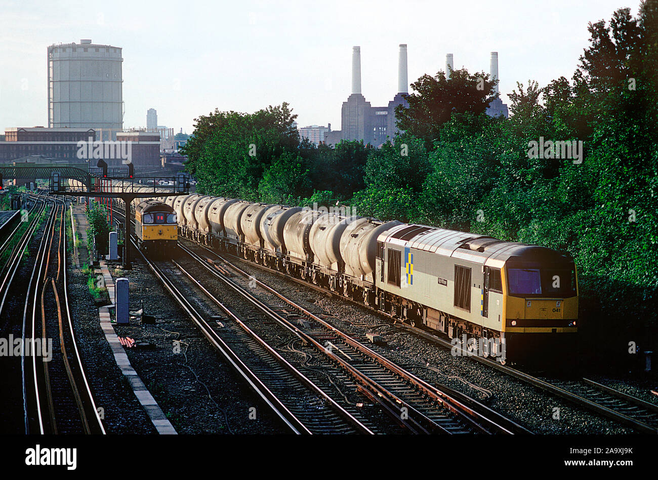 A class 60 diesel locomotive number 60041 working at train of cement ...