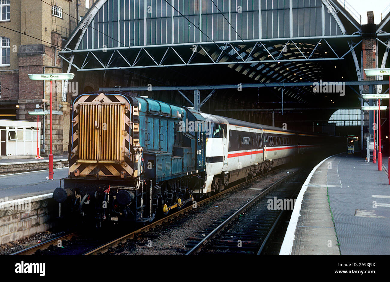 A class 08 diesel shunter number 08855 stands at the head of a reverse ...