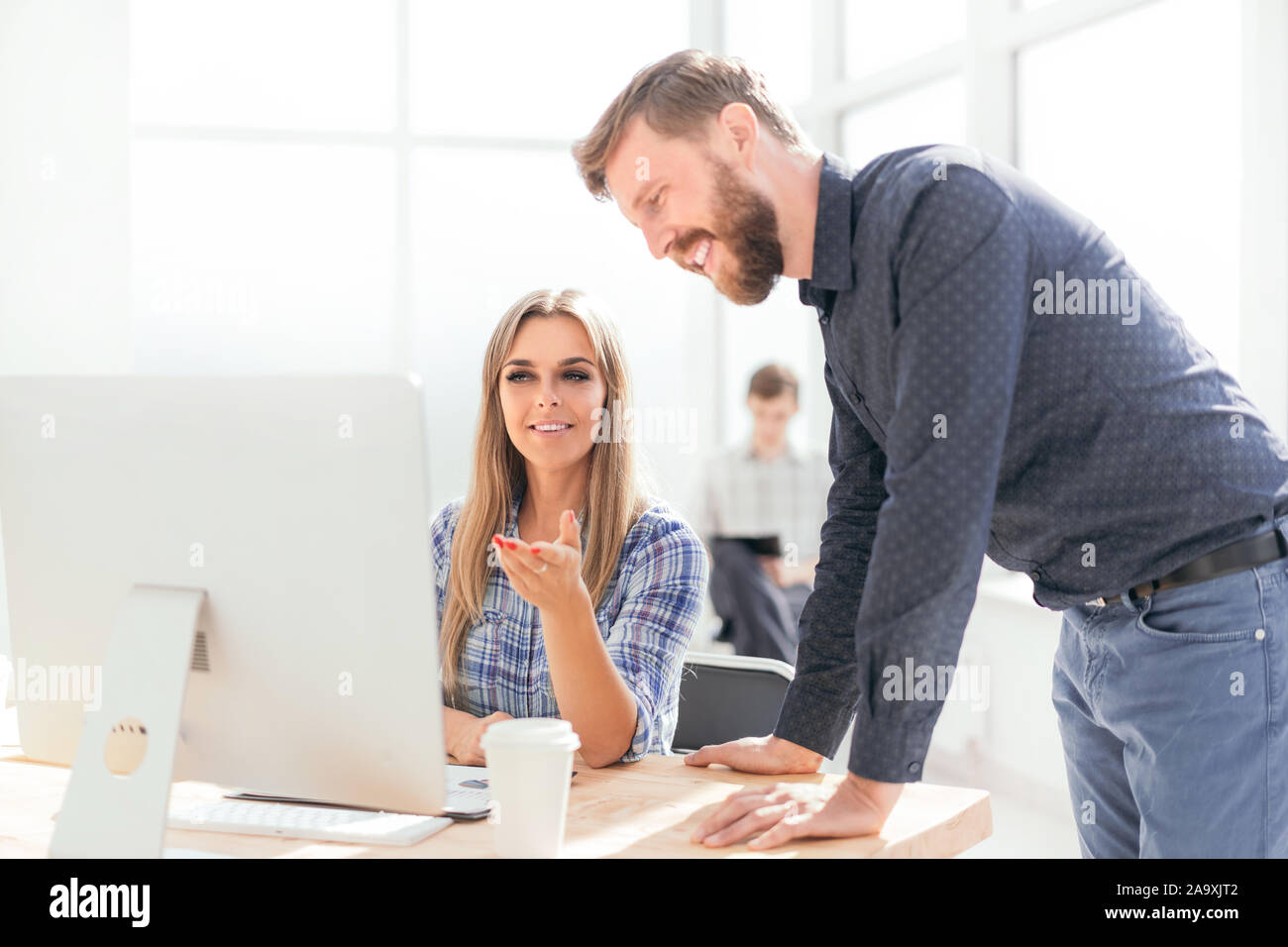 Male female employees talking online hi-res stock photography and ...