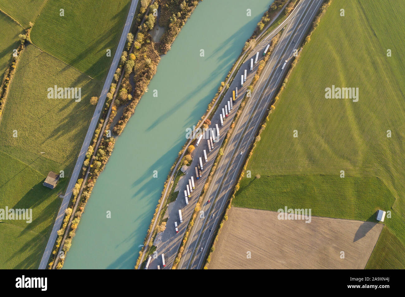 Top down aerial view of highway interstate road with fast moving ...