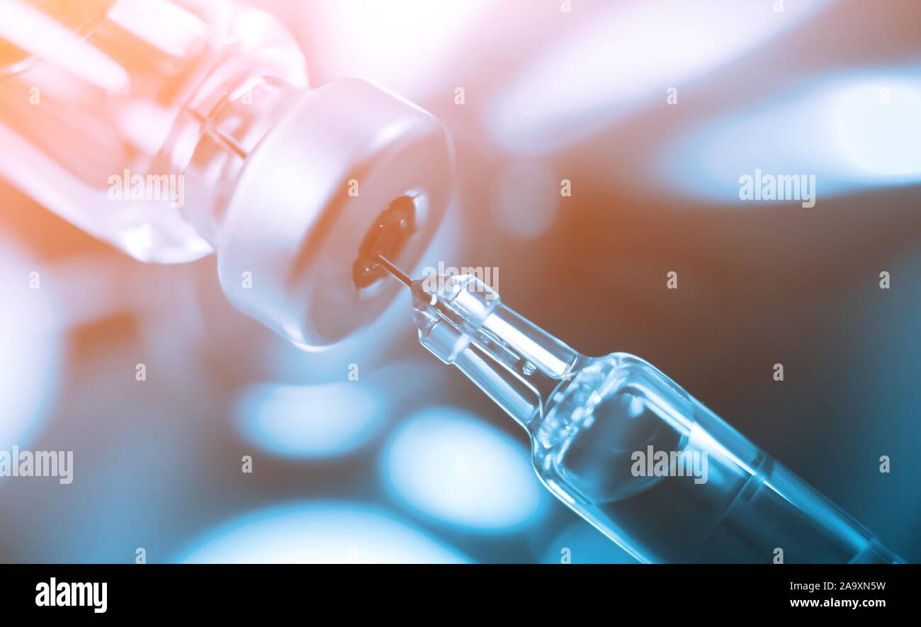 Vaccine vial dose flu shot drug needle syringe,medical concept ...