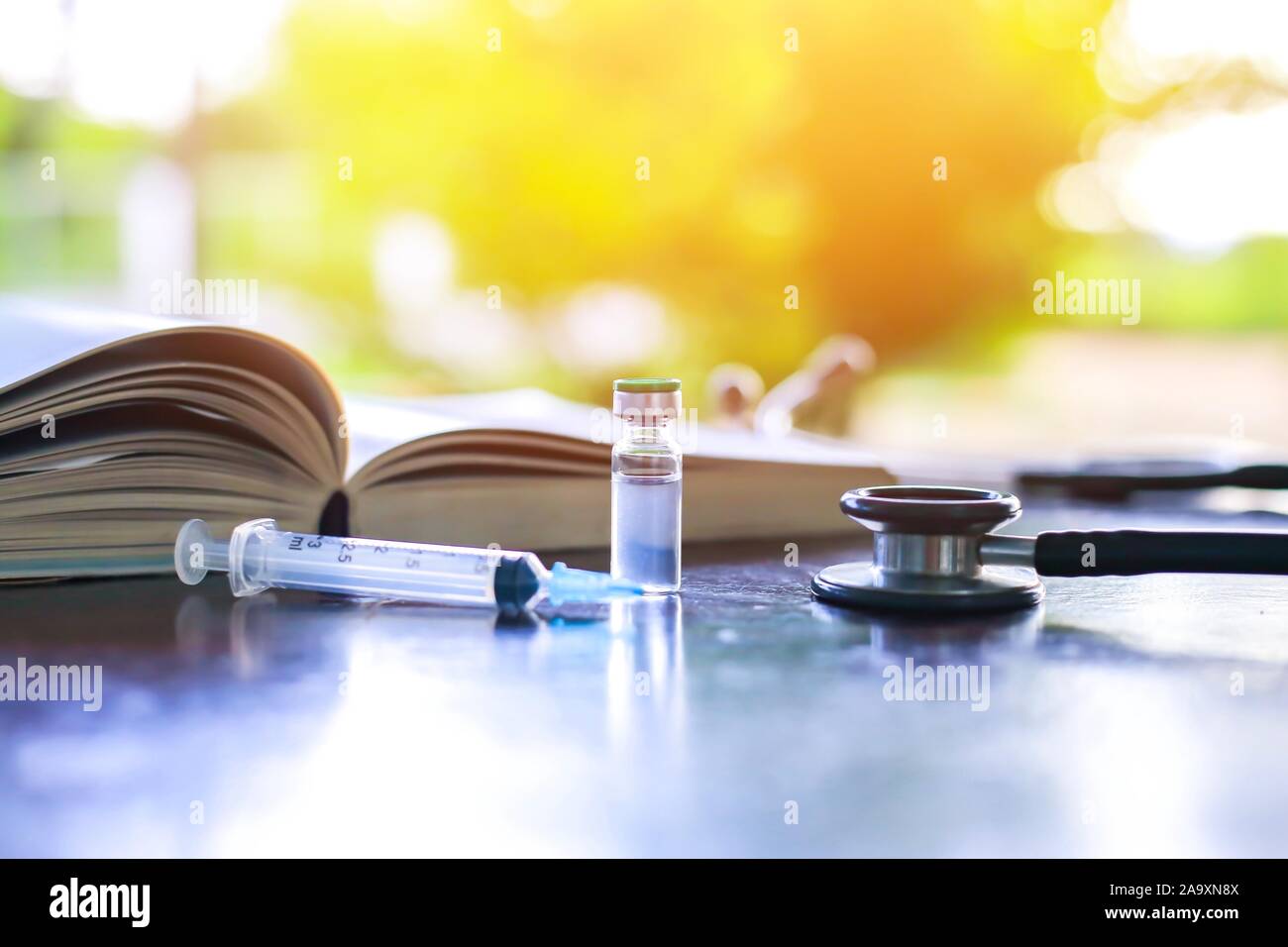Vaccine vial dose flu shot drug needle syringe,medical concept ...