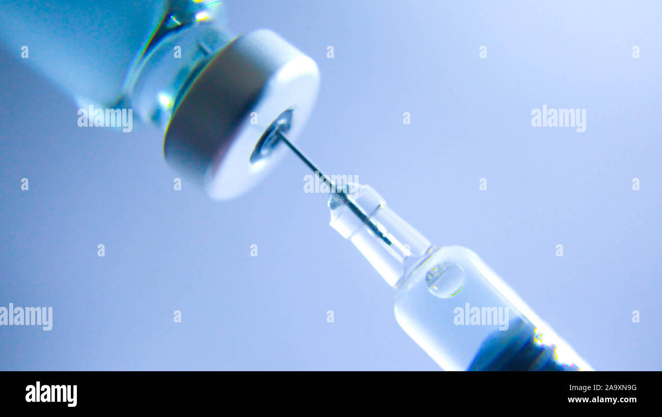 Vaccine vial dose flu shot drug needle syringe,medical concept ...