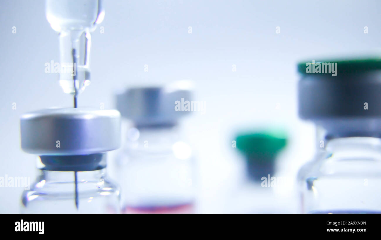 Vaccine vial dose flu shot drug needle syringe,medical concept ...