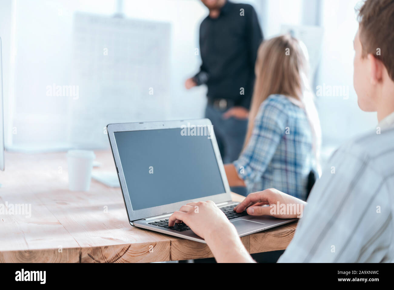 close up. employee working laptop in the office Stock Photo - Alamy