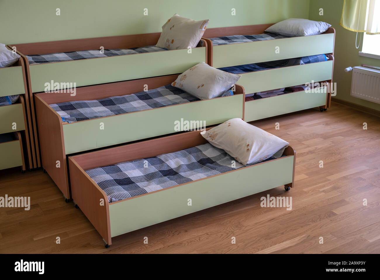 New kindergarten bedroom small beds hi-res stock photography and images ...