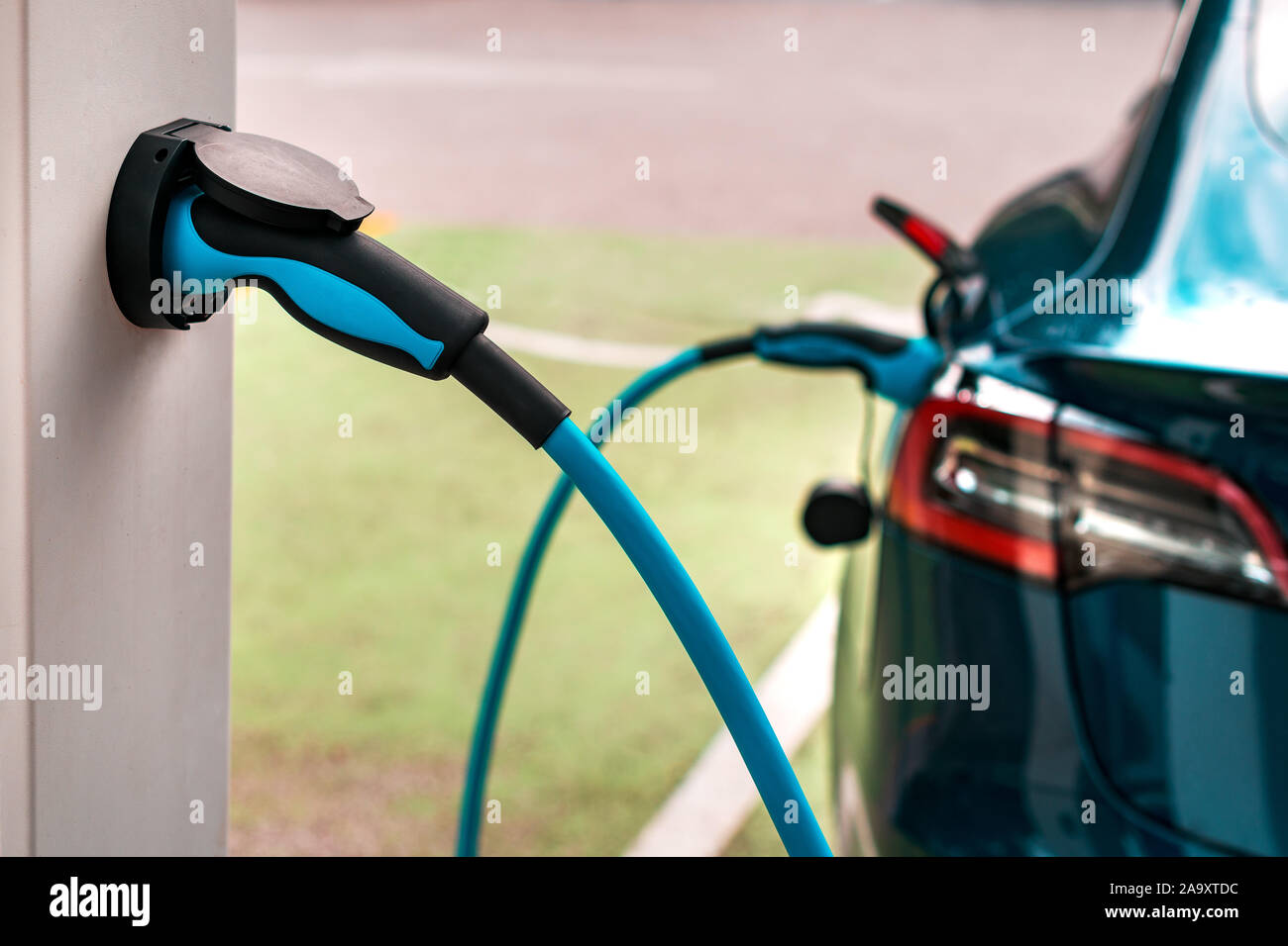 Electric vehicle charging station point, closeup of unit plug Stock ...