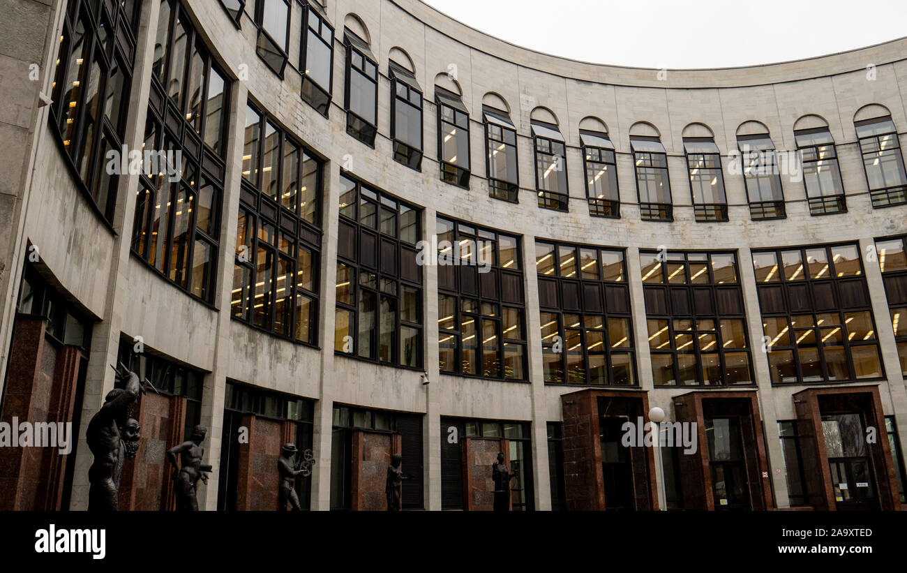 Arched building with ancient marble sculptures Stock Photo - Alamy