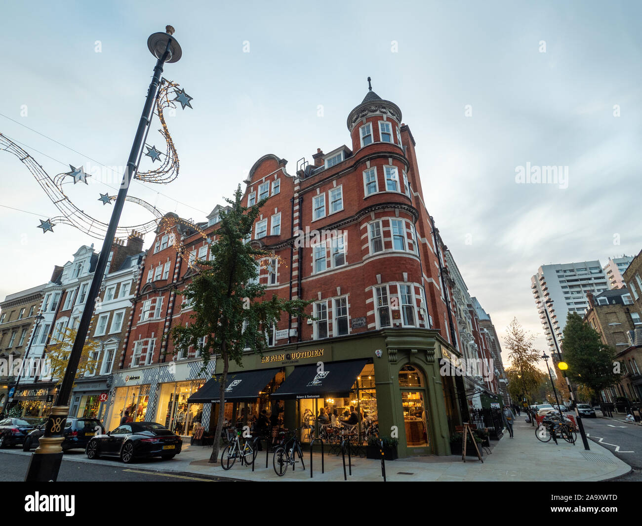 Marylebone High street approaching dusk with the shop lights on ...