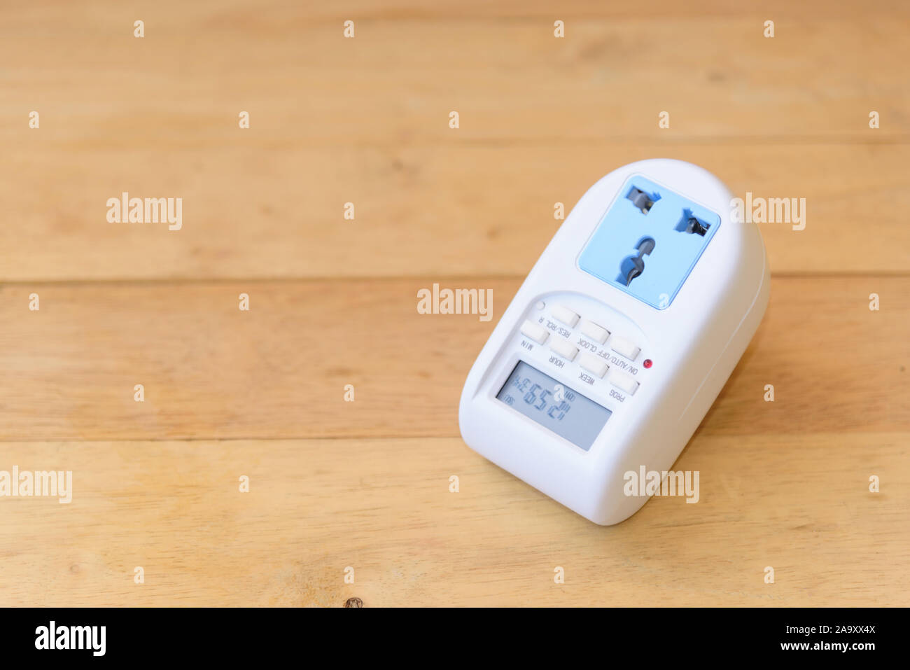 Digital electric plug timer for auto ON/OFF electronics Stock Photo - Alamy