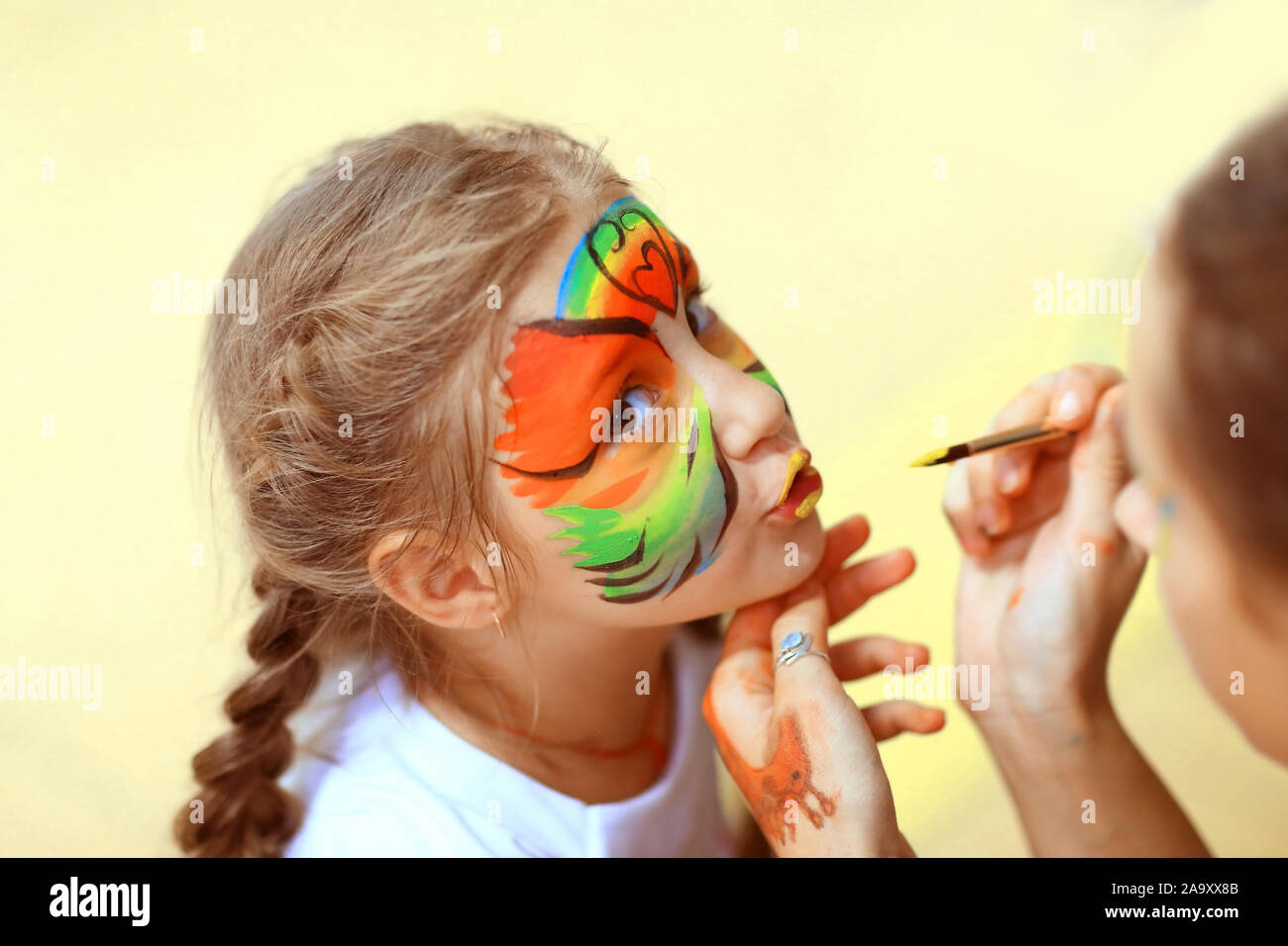 children's makeup artist, does animation make-up on little girls Stock ...