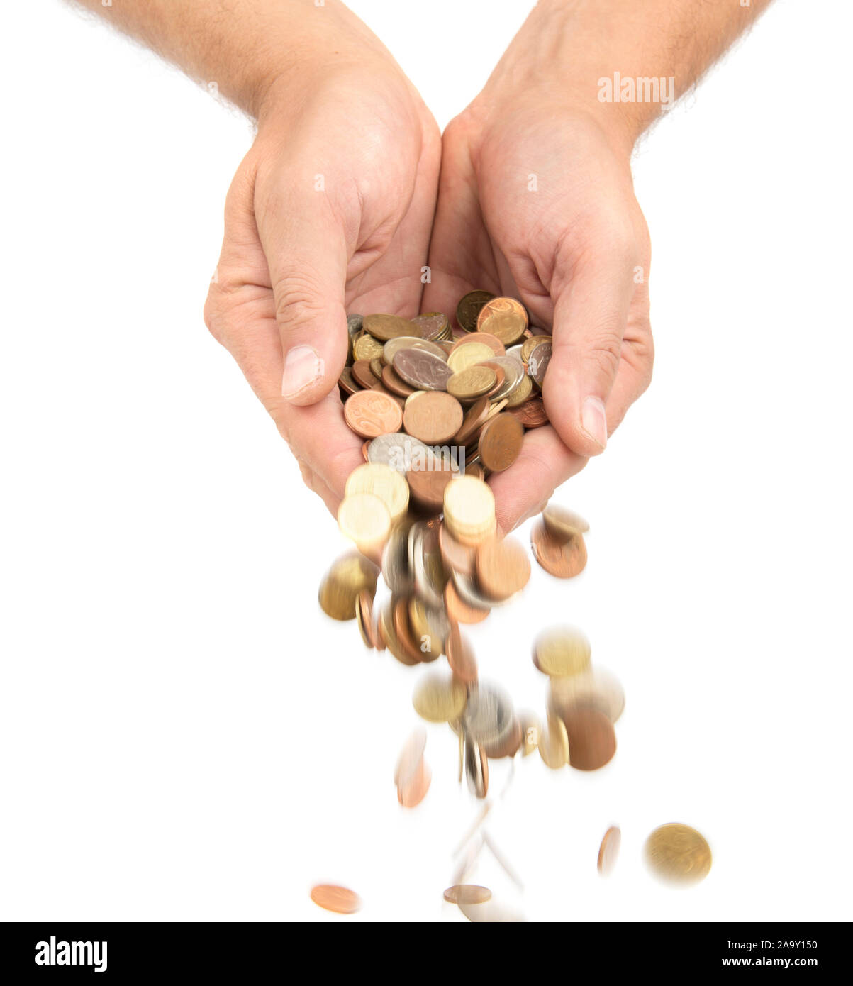 Coins of different countries falling from palm hands, isolated on white ...