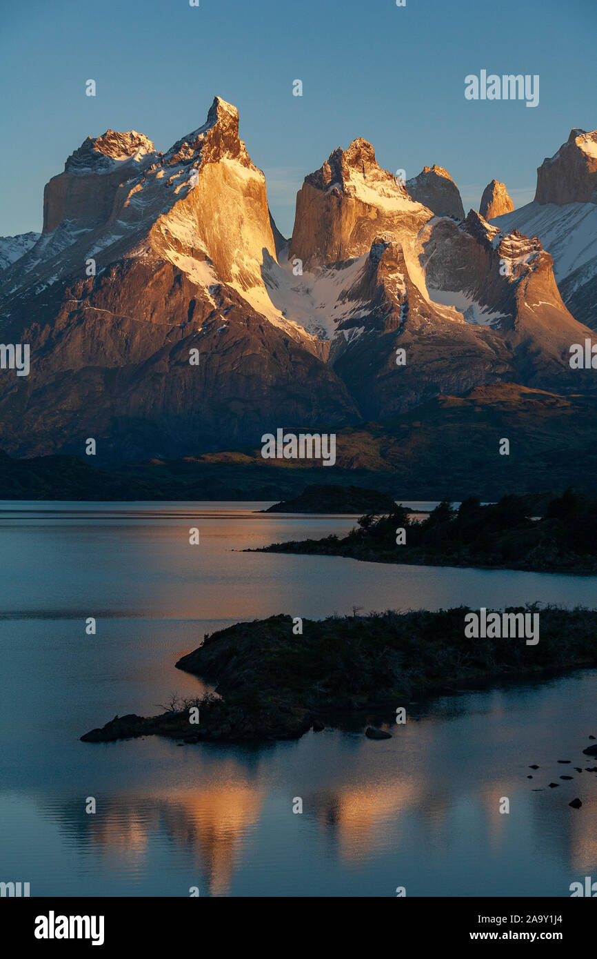 Dawn light on the mountain peaks of Cordillera del Paine in Torres del Paine National Park in ...