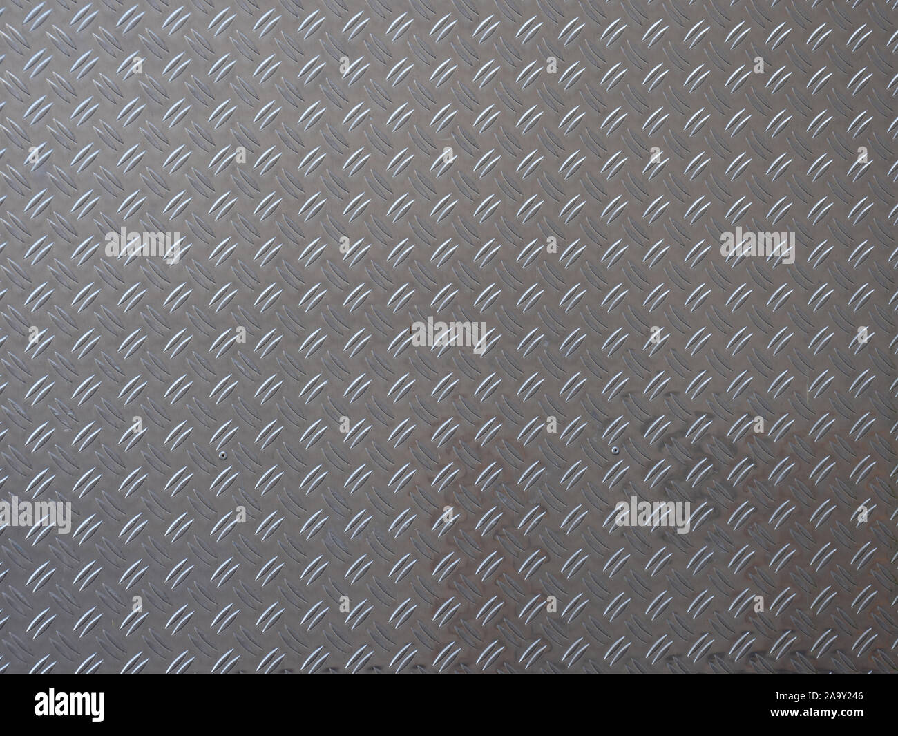 Chrome checker plate metal sheet background Stock Photo - Alamy