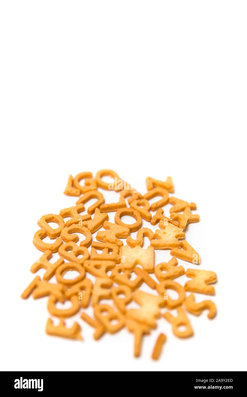 A pile of alphabet cake letters isolated on the white background Stock ...