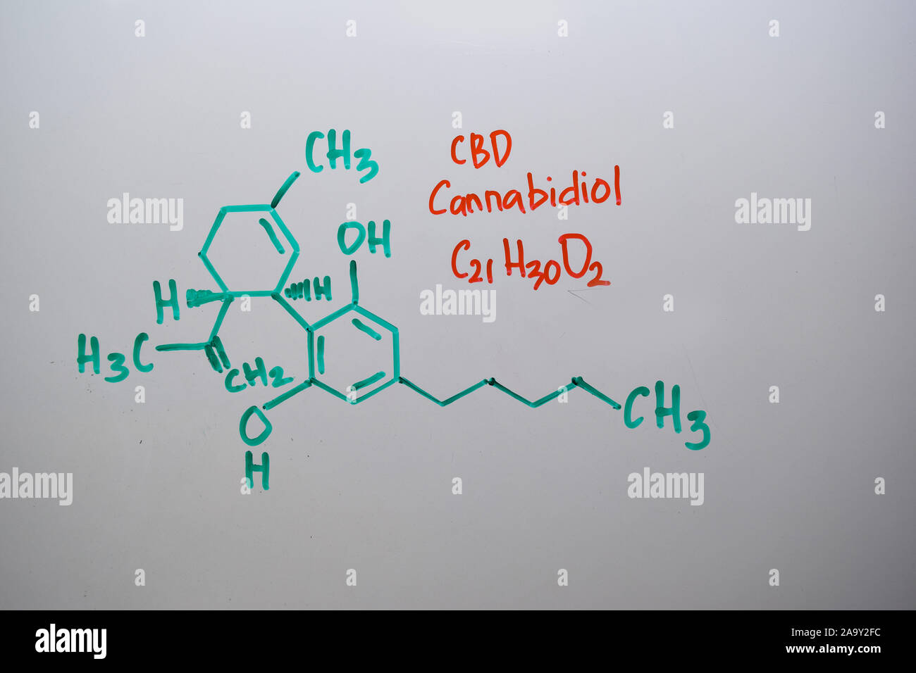 Cannabidiol (CBD) write on the white board. Structural chemical formula ...
