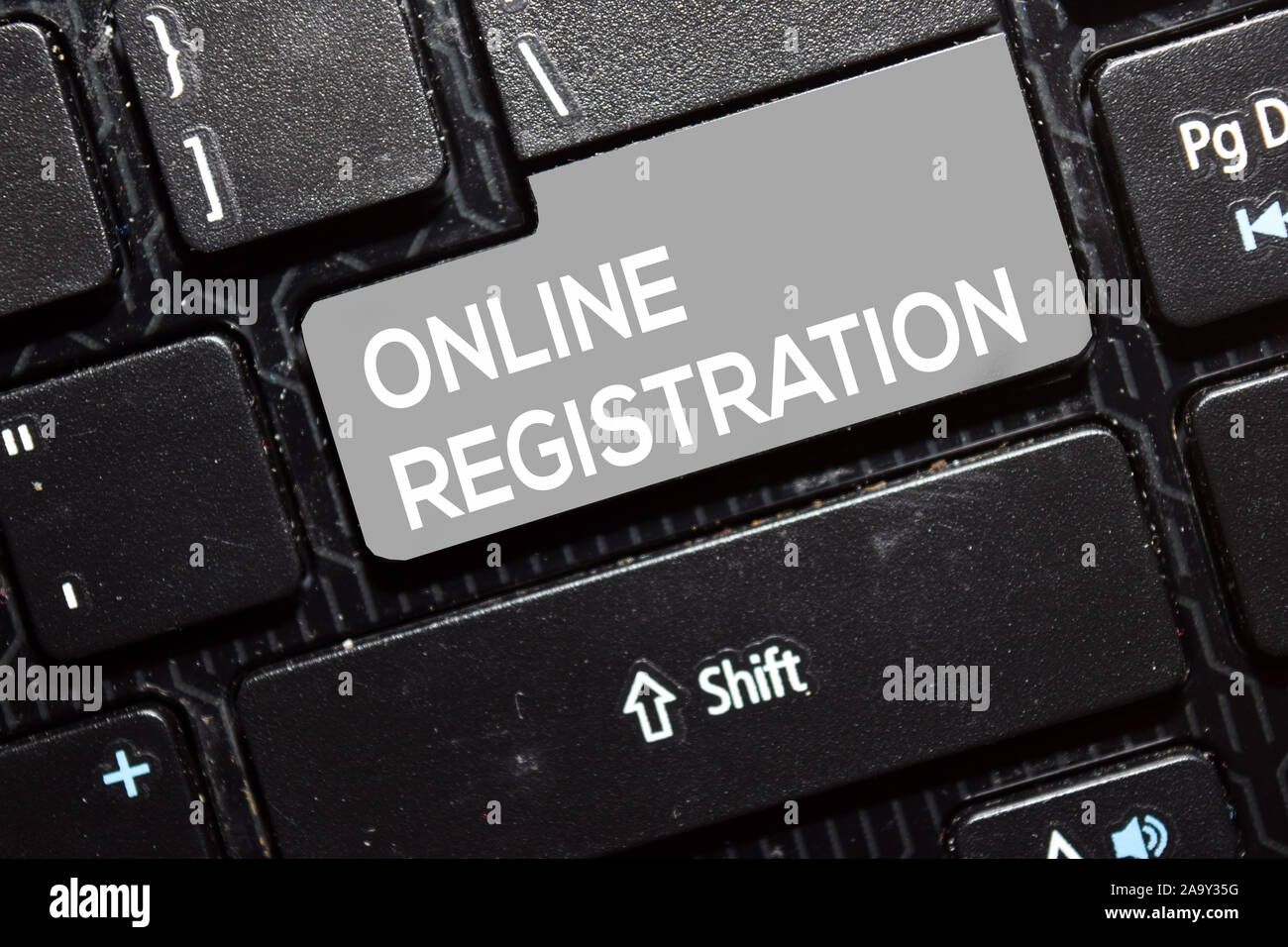 Online Registration write on keyboard isolated on laptop background ...