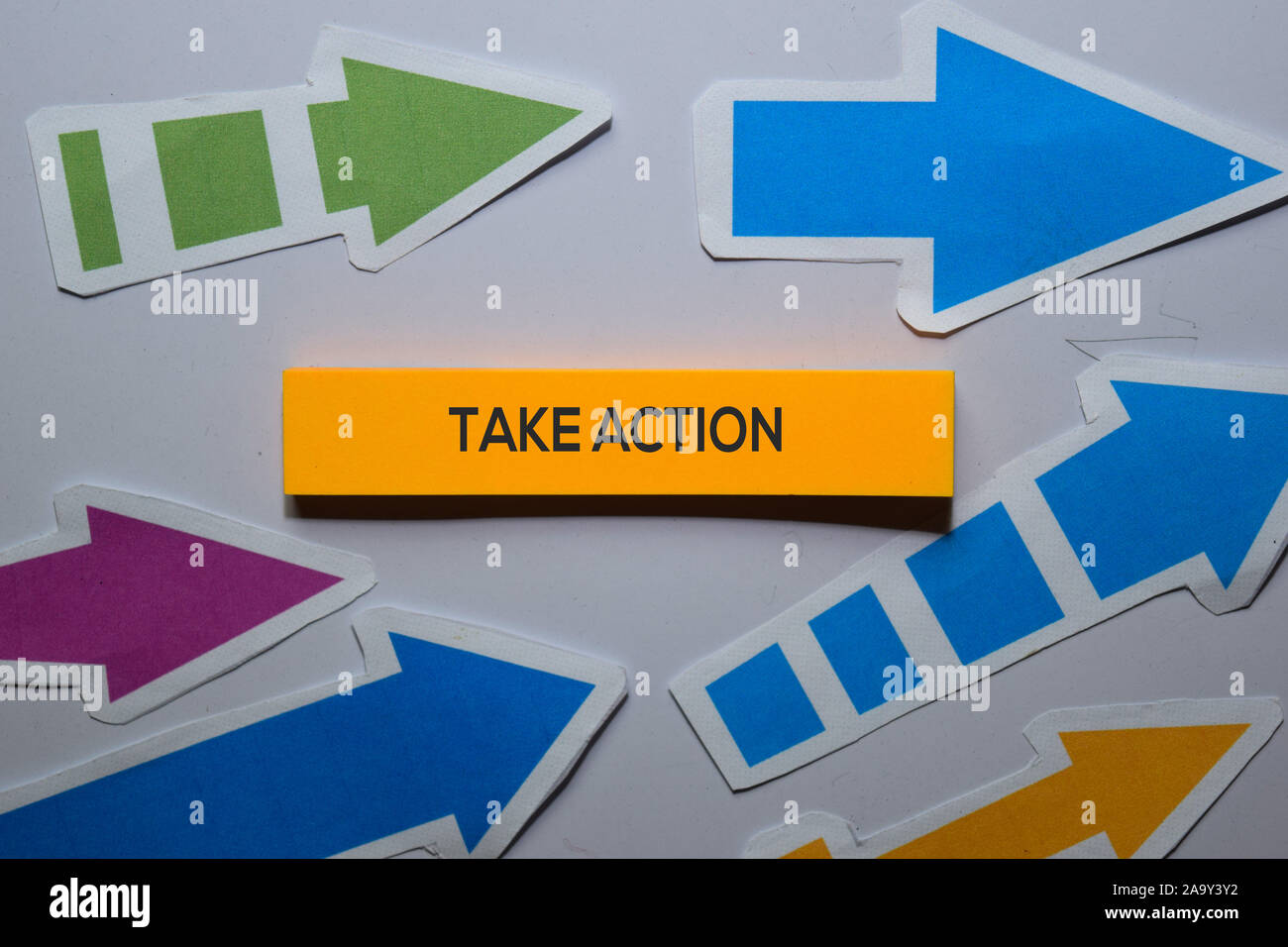 Take Action text on sticky notes isolated on office desk Stock Photo ...