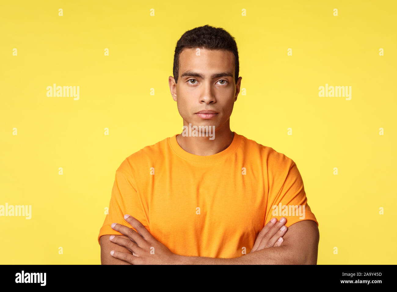 Serious-looking man getting angry, look strict and determined, cross ...