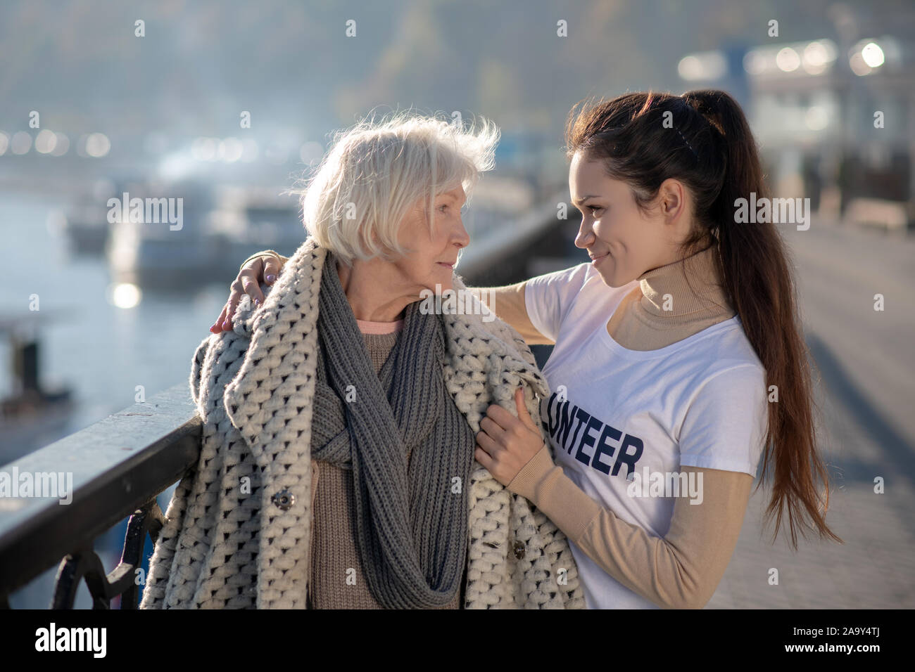 Helpful kind smiling hi-res stock photography and images - Alamy