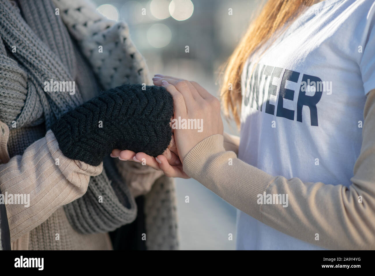 Homeless people shake hands in hi-res stock photography and images - Alamy