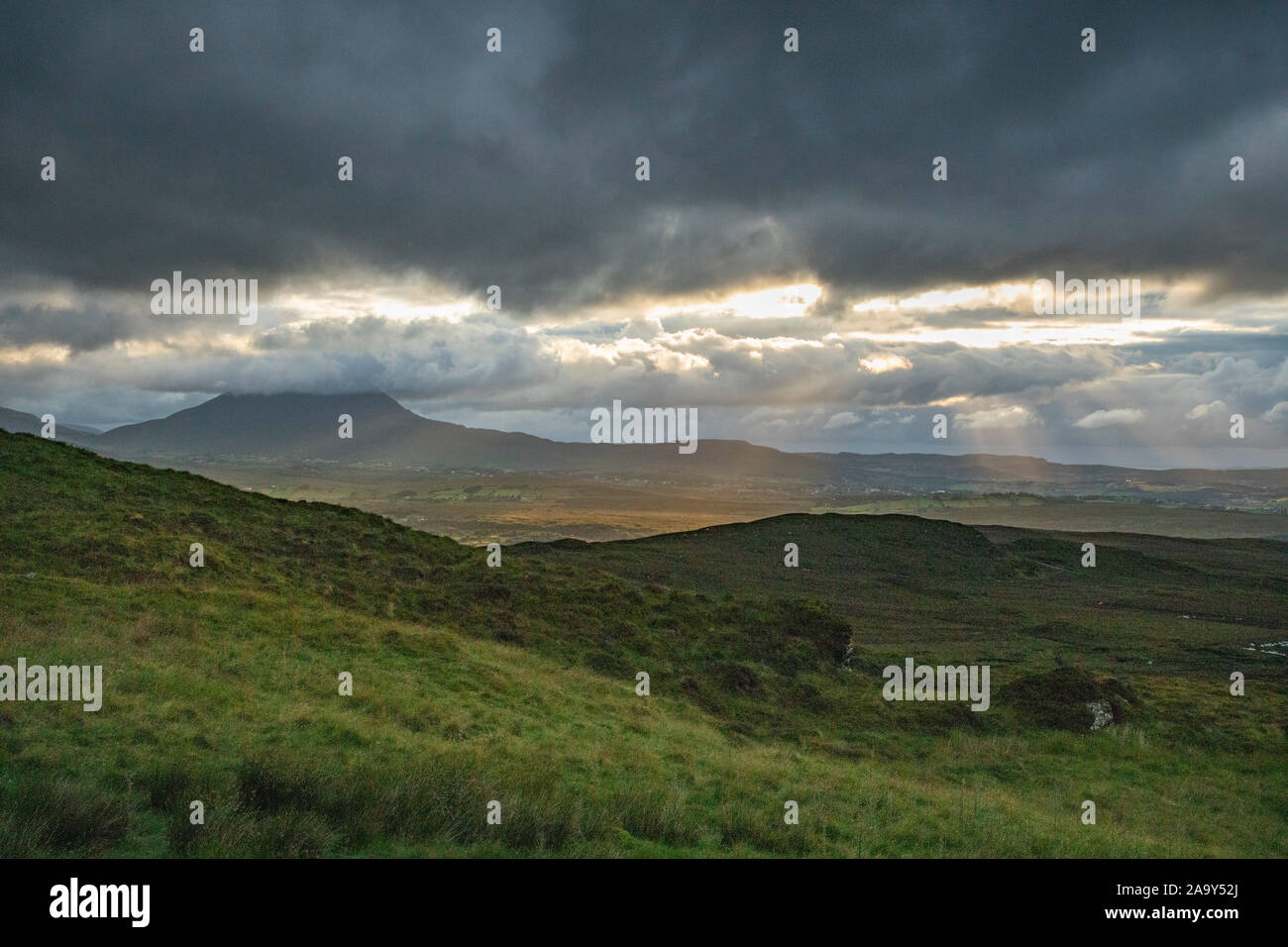 Gods rays shining through storm clouds in County Donegal Republic of ...