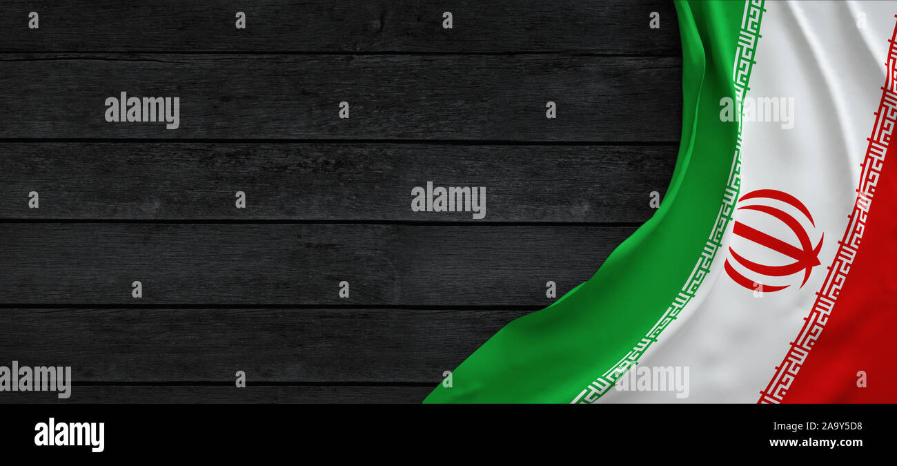 Flag of Iran, fabric on dark wood Stock Photo - Alamy