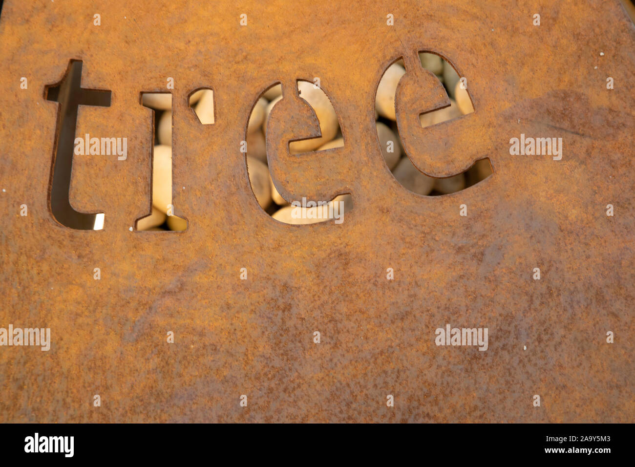 Tree written in copper Stock Photo - Alamy