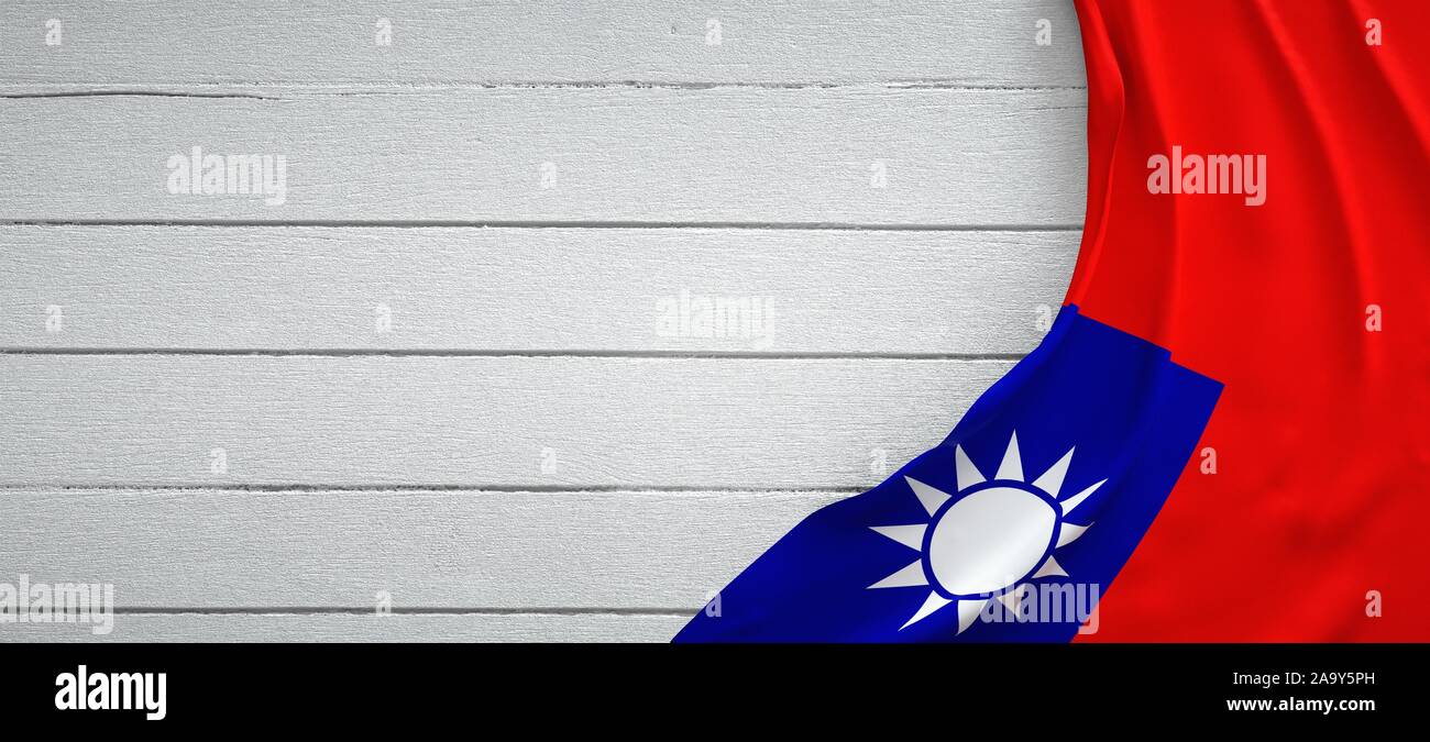 Taiwan flag, on top of white wood. Wrinkled fabric Stock Photo - Alamy