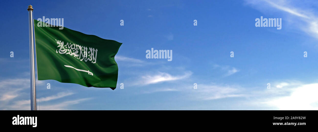 Flag of Saudi Arabia rise waving to the wind with sky in the background ...