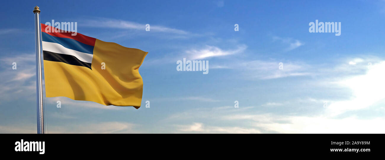Flag of Manchukuo rise waving to the wind with sky in the background ...