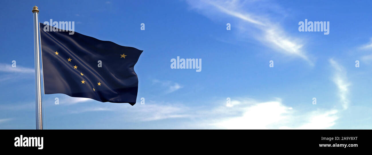 Flag of Alaska rise waving to the wind with sky in the background Stock ...