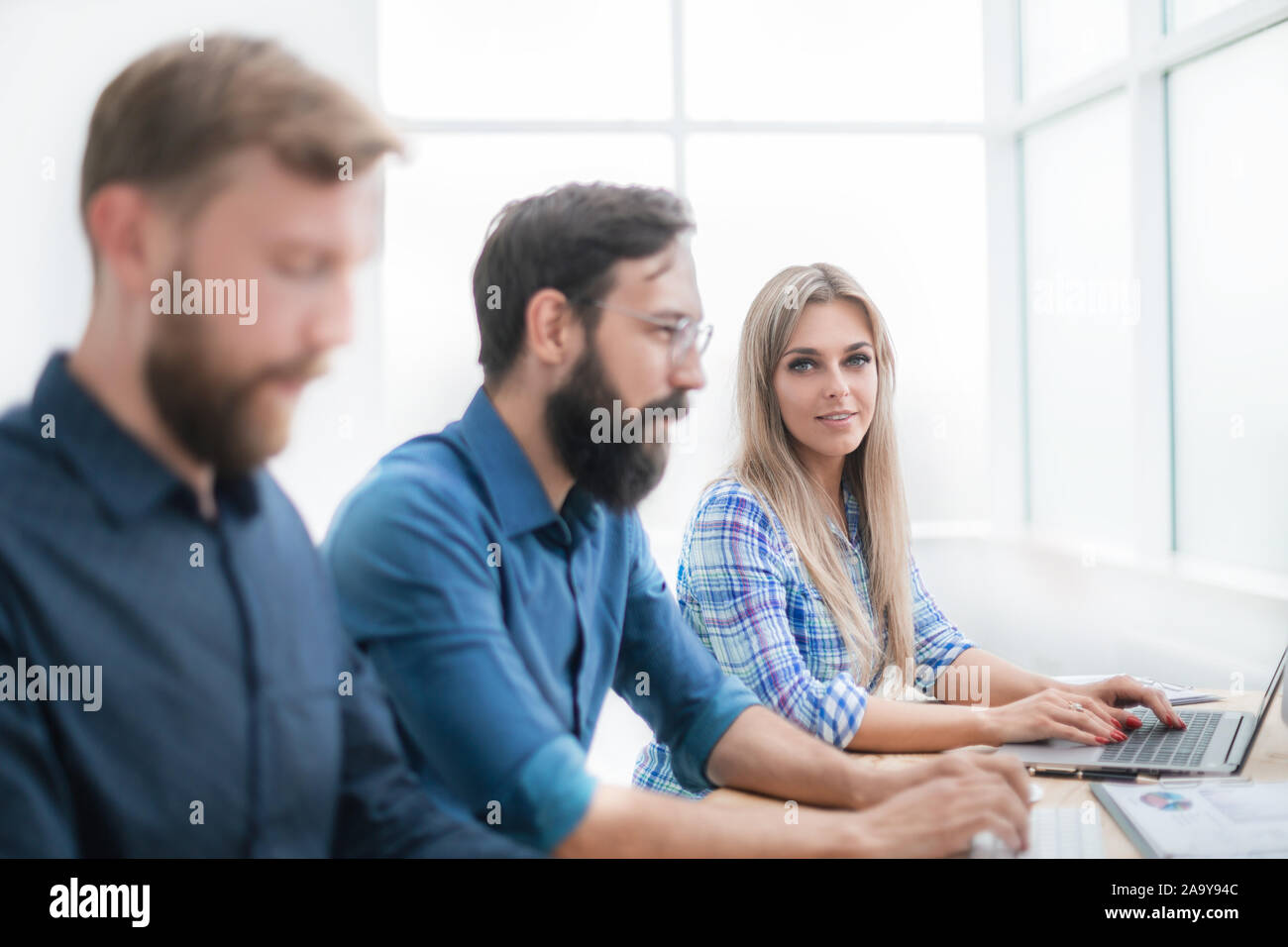 employees work together in a modern office Stock Photo - Alamy